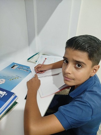 محمد یاسین رحمان زاده : دانش آموز قهرمان نگاه به آینده